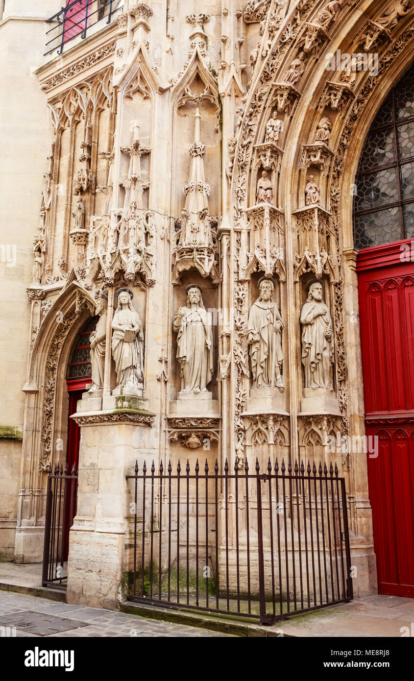 Statues of saints on the facade of the church of Saint-Merry. Paris ...