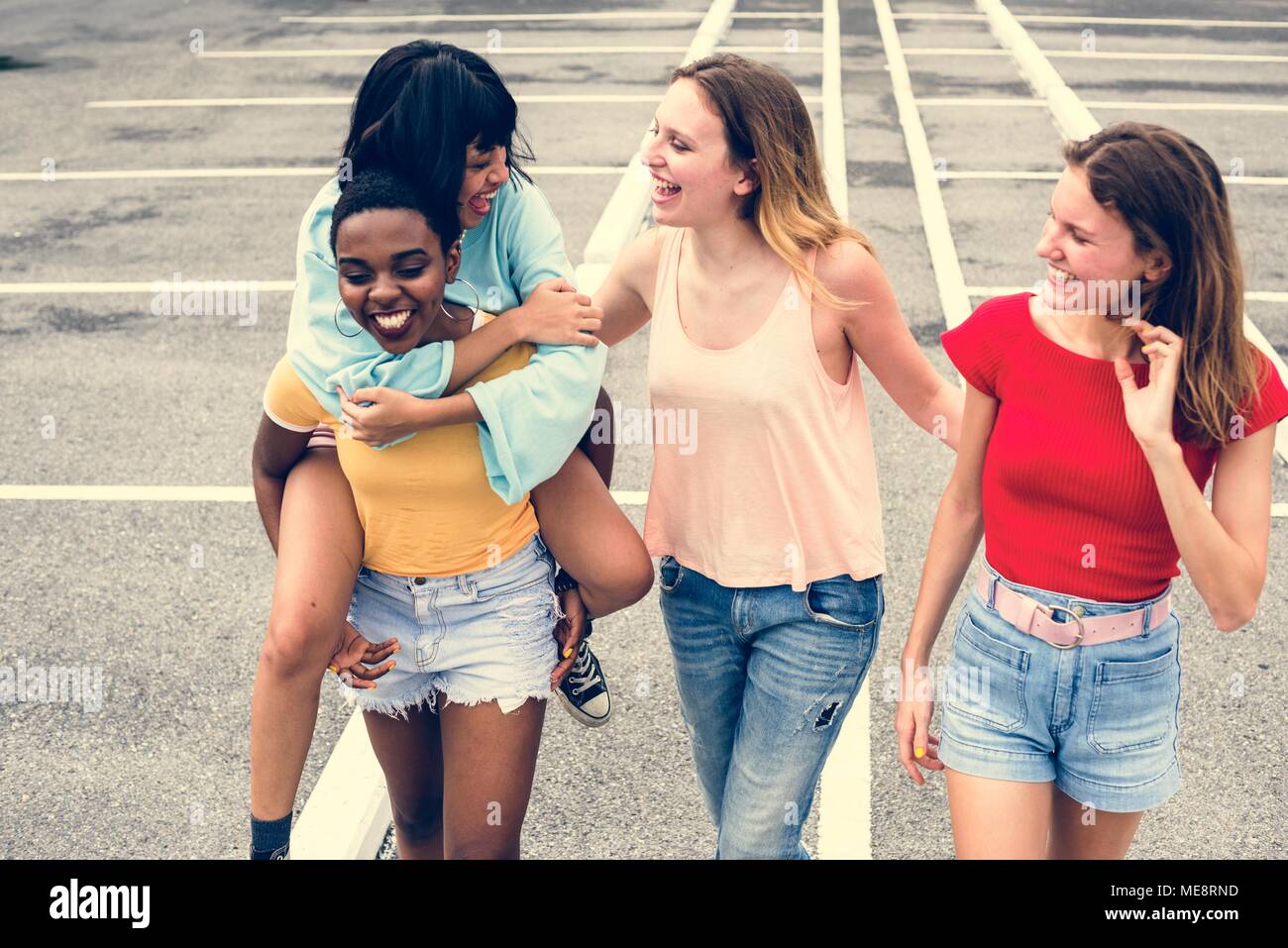 Group of diverse women walking together Stock Photo - Alamy
