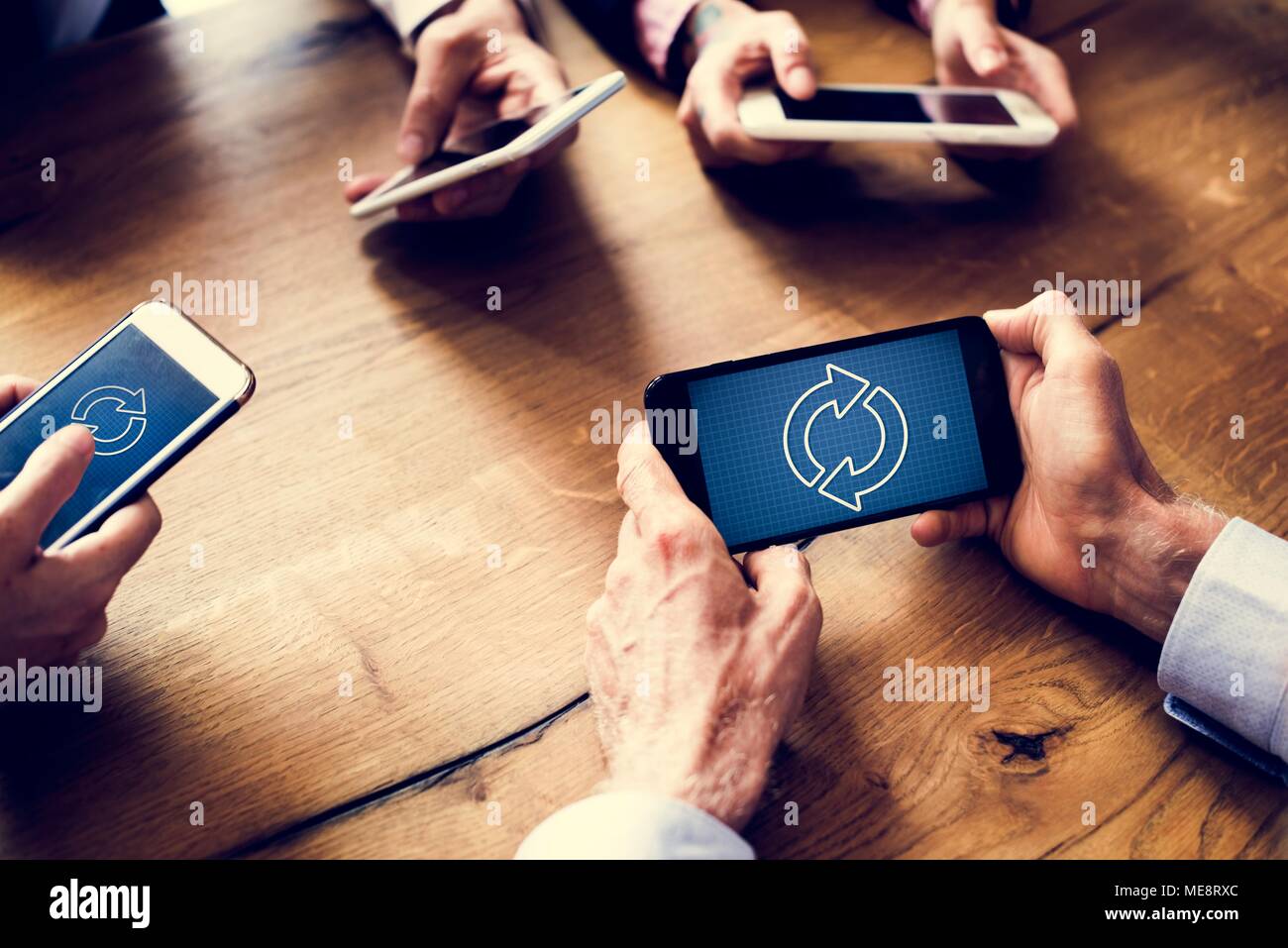 Business people using smart phones Stock Photo - Alamy