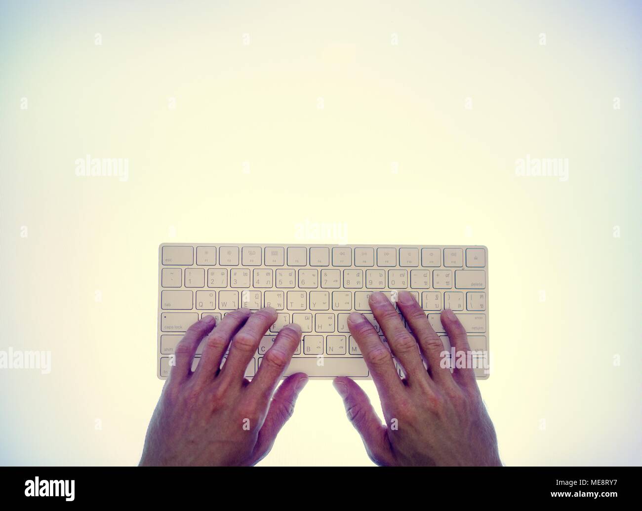 Business person typing Stock Photo - Alamy