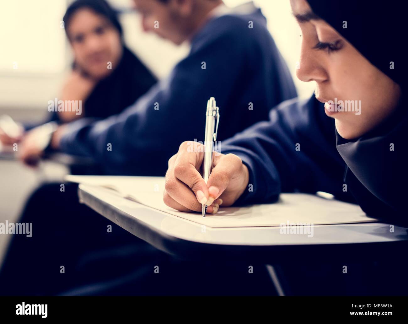 diverse muslim children studying in classroom Stock Photo - Alamy