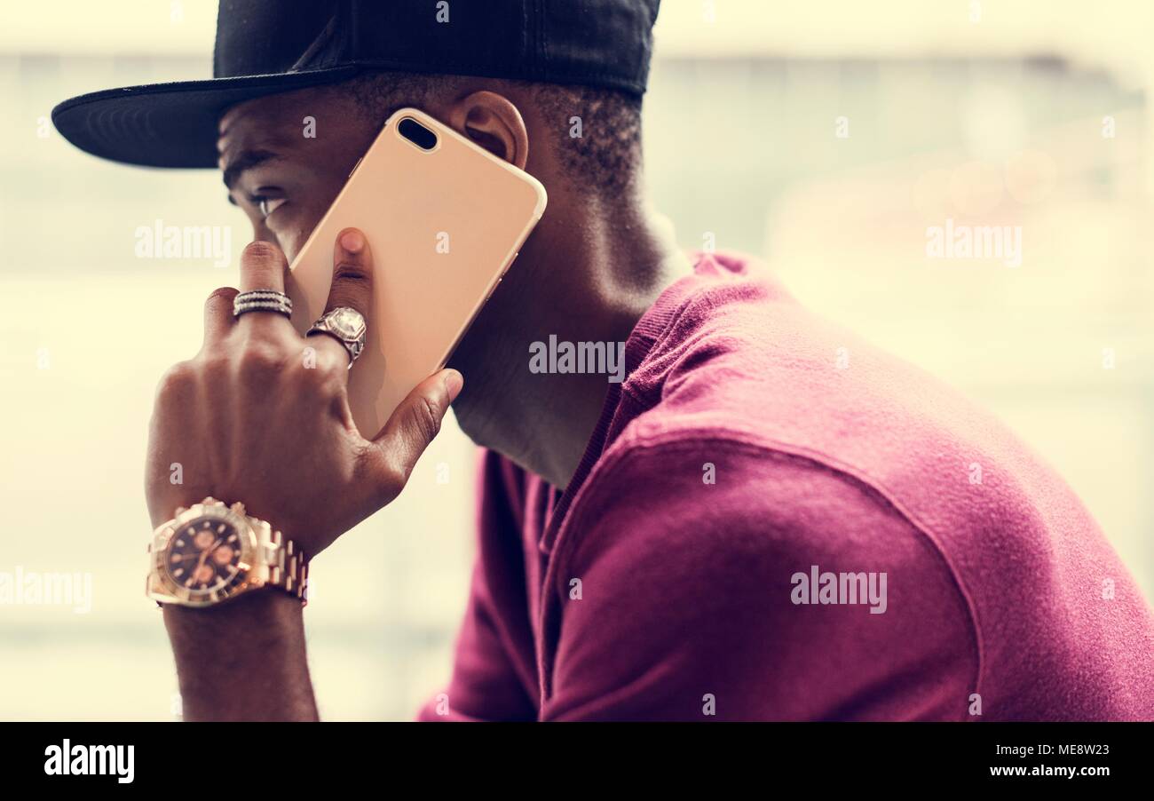 African man using mobile phone Stock Photo - Alamy