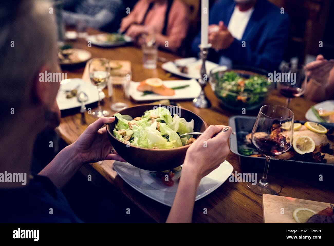 Group of diverse friends are having a dinner together Stock Photo - Alamy