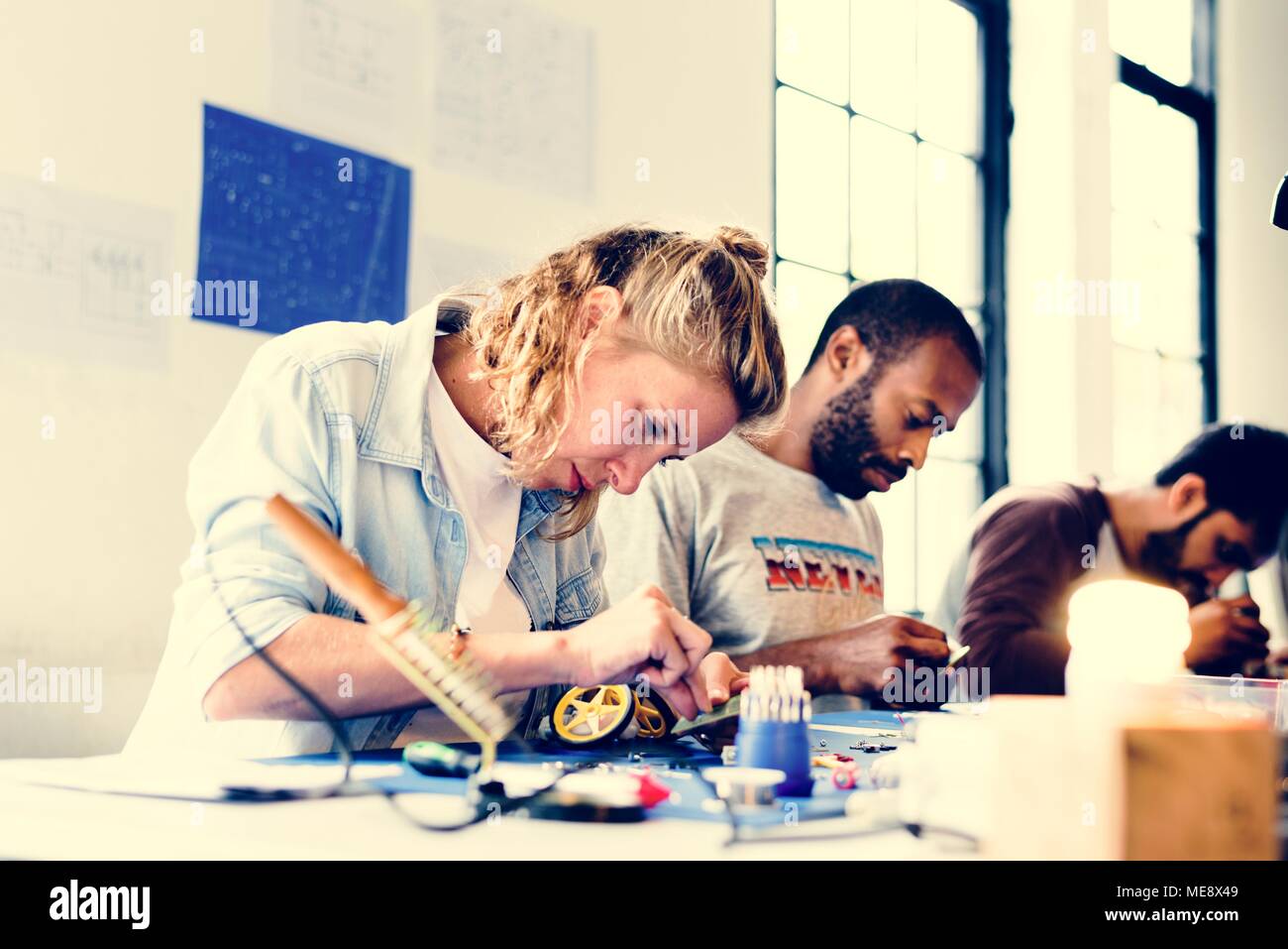 Technician working on robot prototype Stock Photo - Alamy