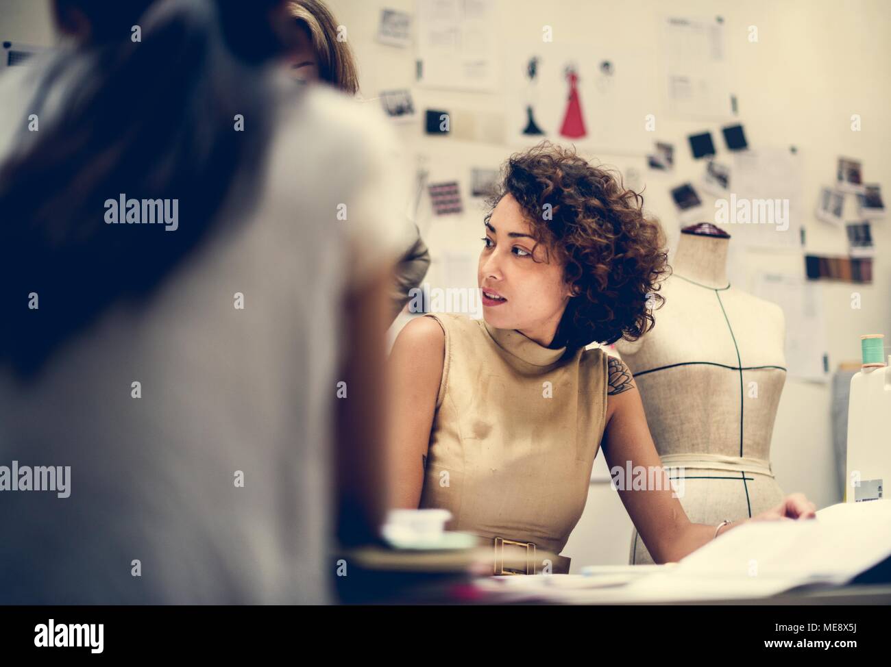 Woman working on projects Stock Photo - Alamy