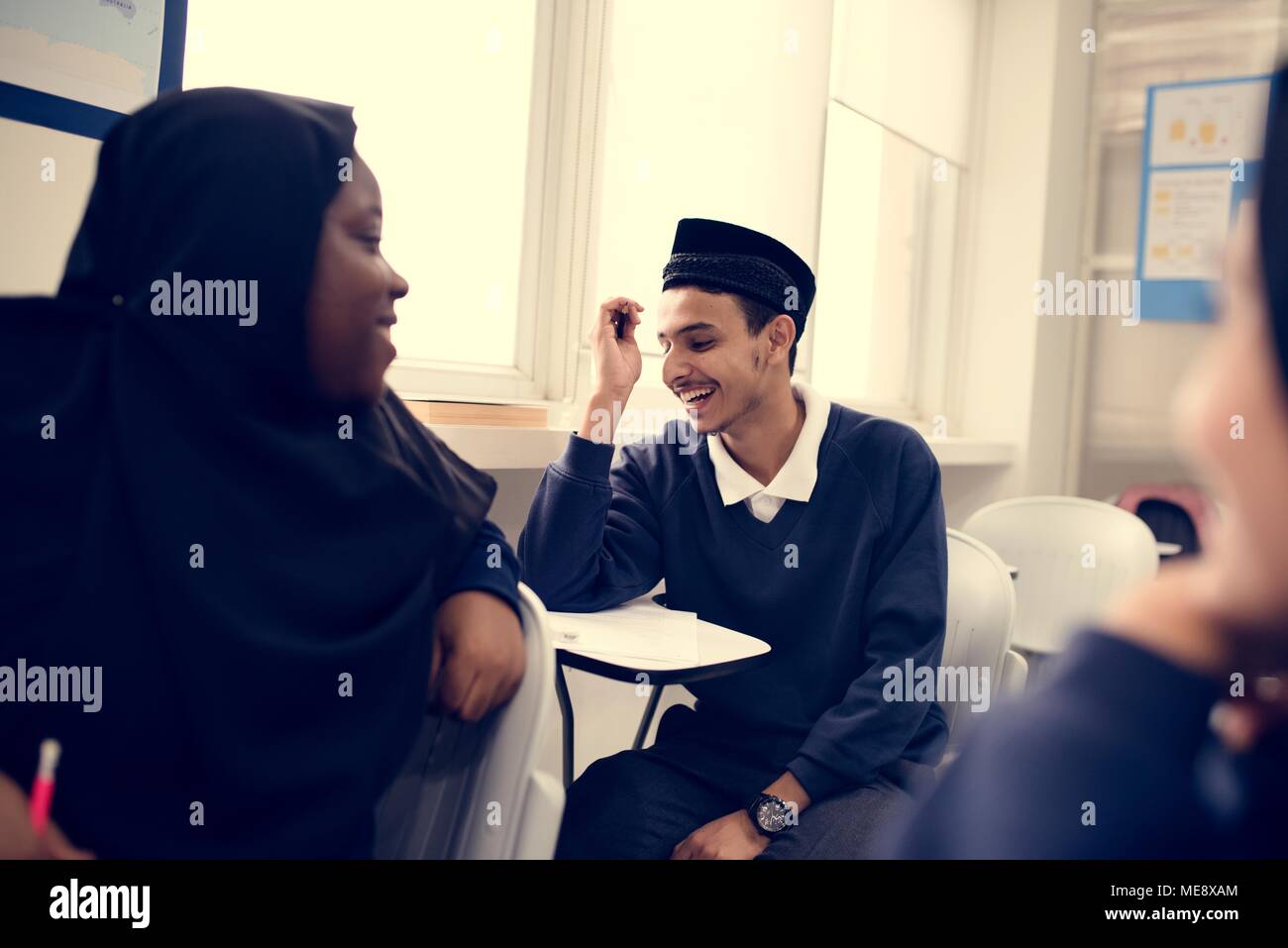 diverse muslim children studying in classroom Stock Photo - Alamy