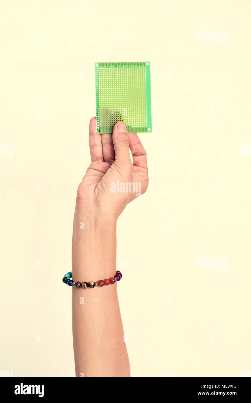 Hand holding computer processor isolated on white background Stock ...