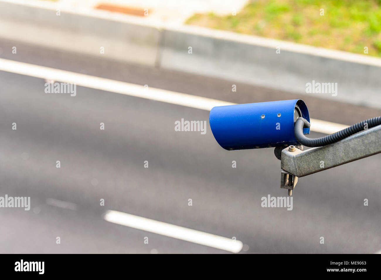 Speed camera monitoring traffic on UK Motorway Stock Photo - Alamy