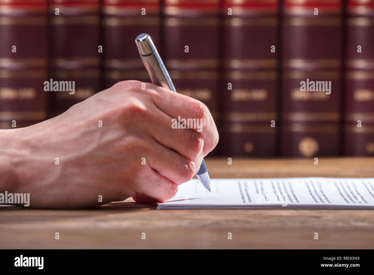 Human hand signing authority document hi-res stock photography and ...