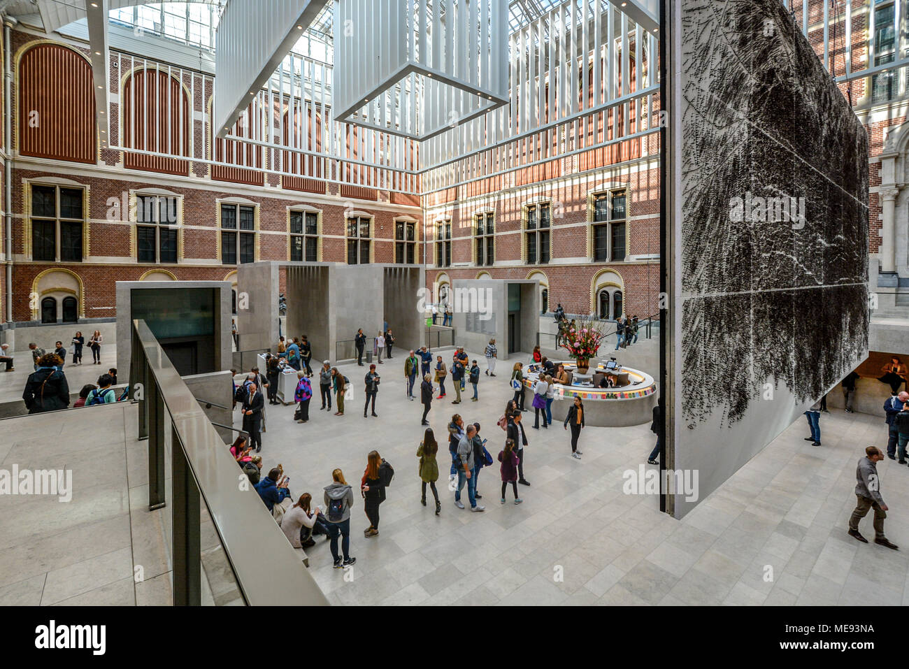 Visitors inside the lobby of the famous art museum, the Rijksmuseum ...
