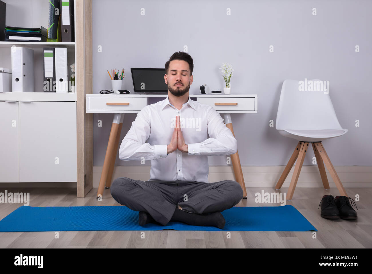 Mat meditating hi-res stock photography and images - Alamy