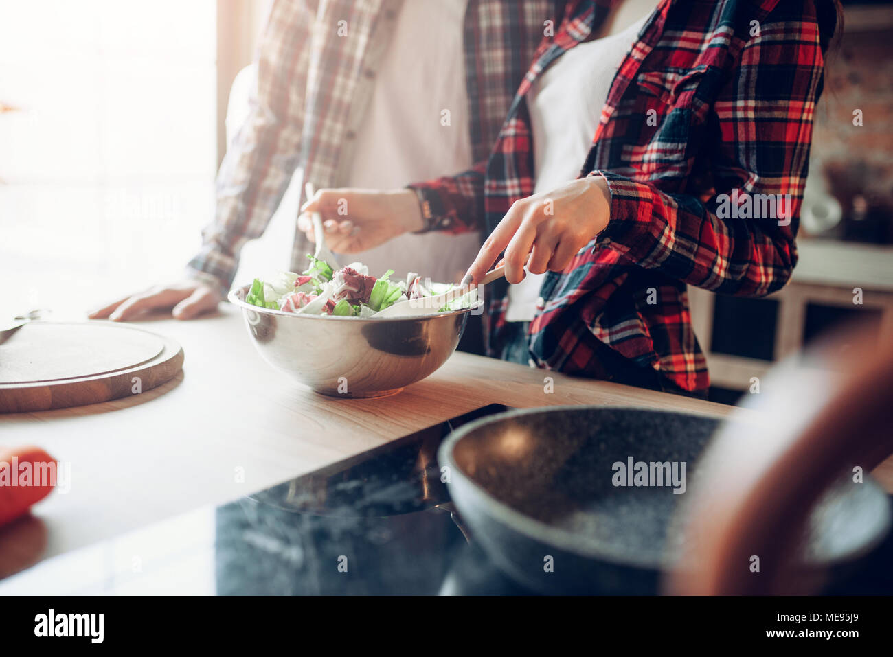 Wife and husband hands, vegetable salad cooking. Fresh diet food ...