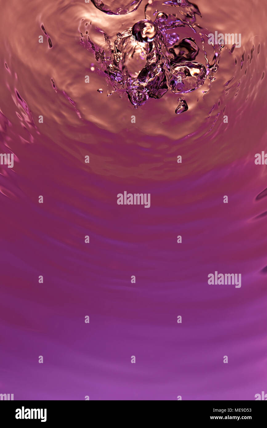 Ripples on liquid background. Colorful water spash background wallpaper ...