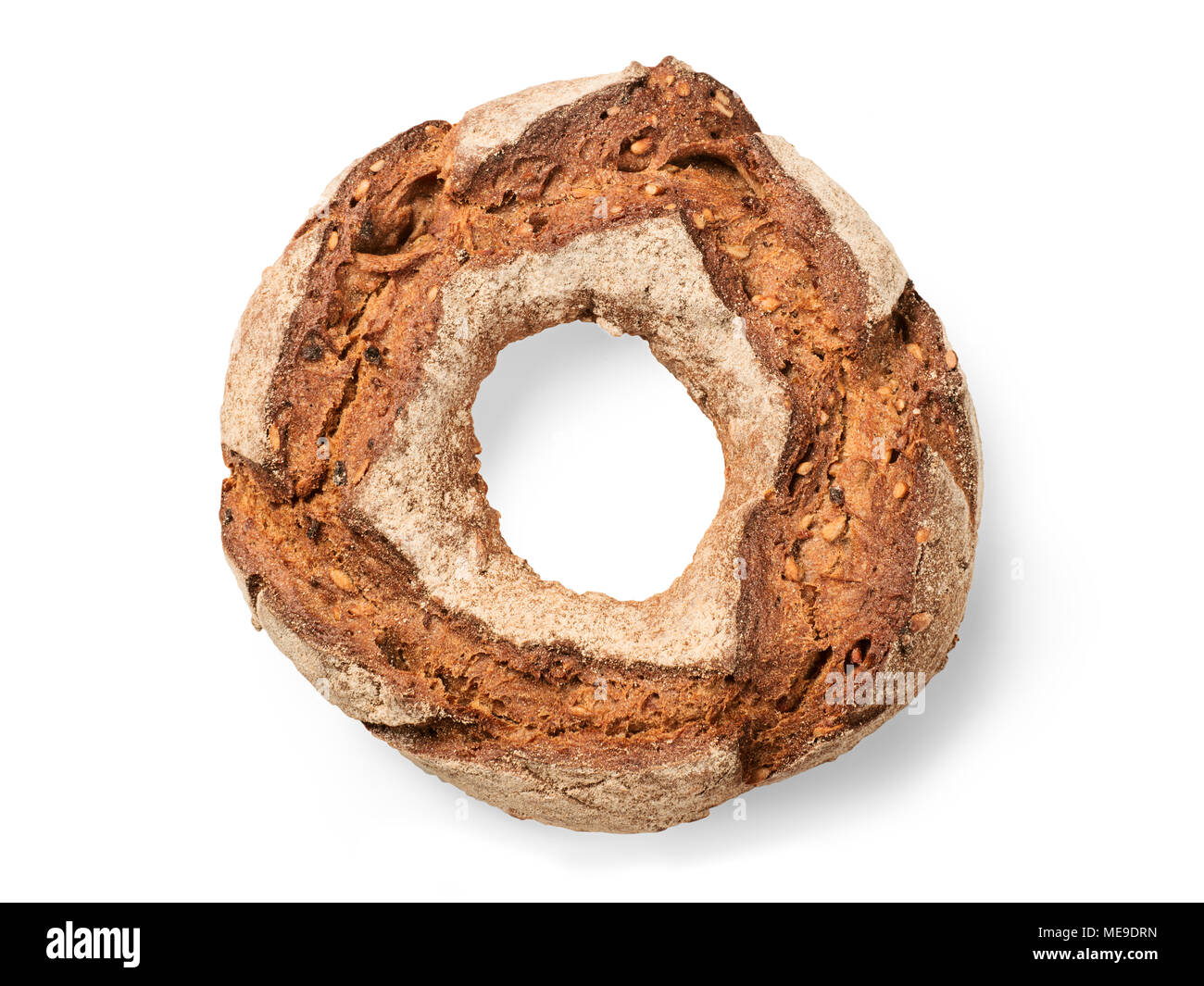 Round freshly baked rustic rye bread. Isolated on white, clipping path ...