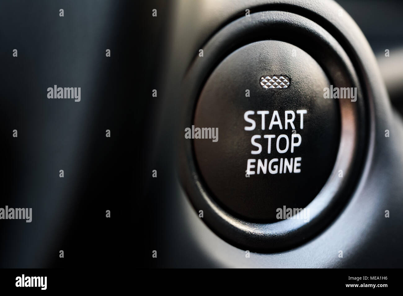 Start stop engine modern new car button Stock Photo - Alamy