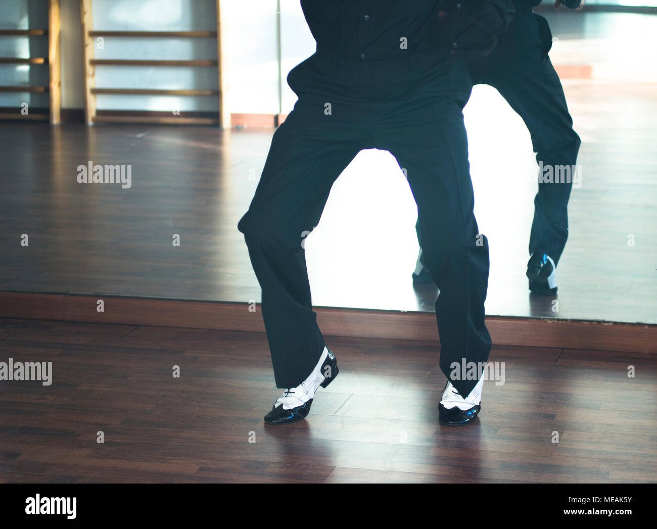 Ballroom dance male dancer and teacher in studio school dancing in ...