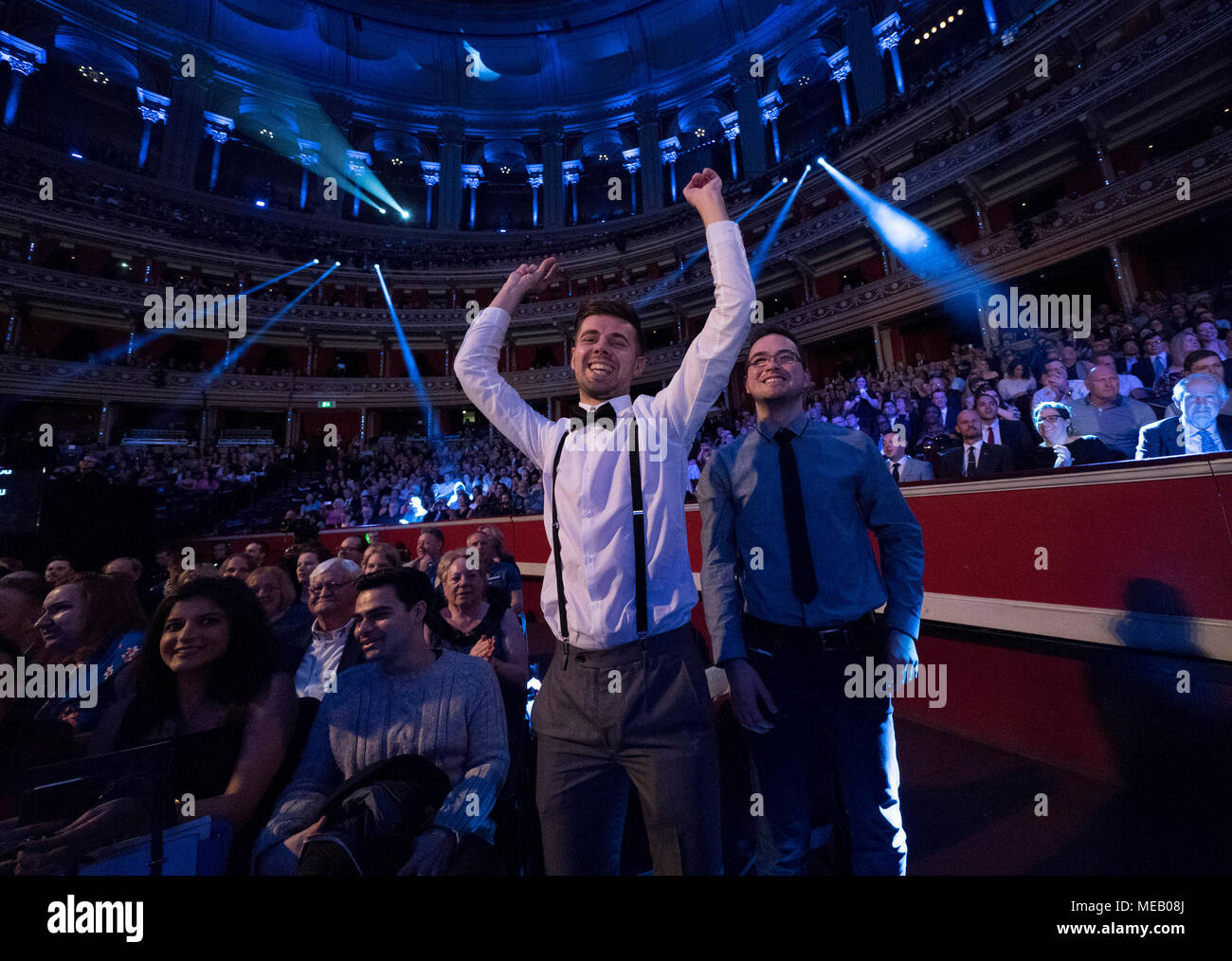 An audience member at the Royal Albert Hall in London dances during a ...