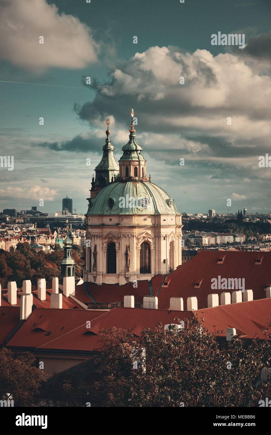 Prague skyline rooftop view with church and dome in Czech Republic ...