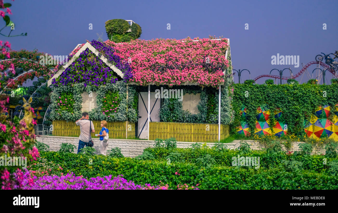 Beautiful houses covered with flowers Stock Photo - Alamy
