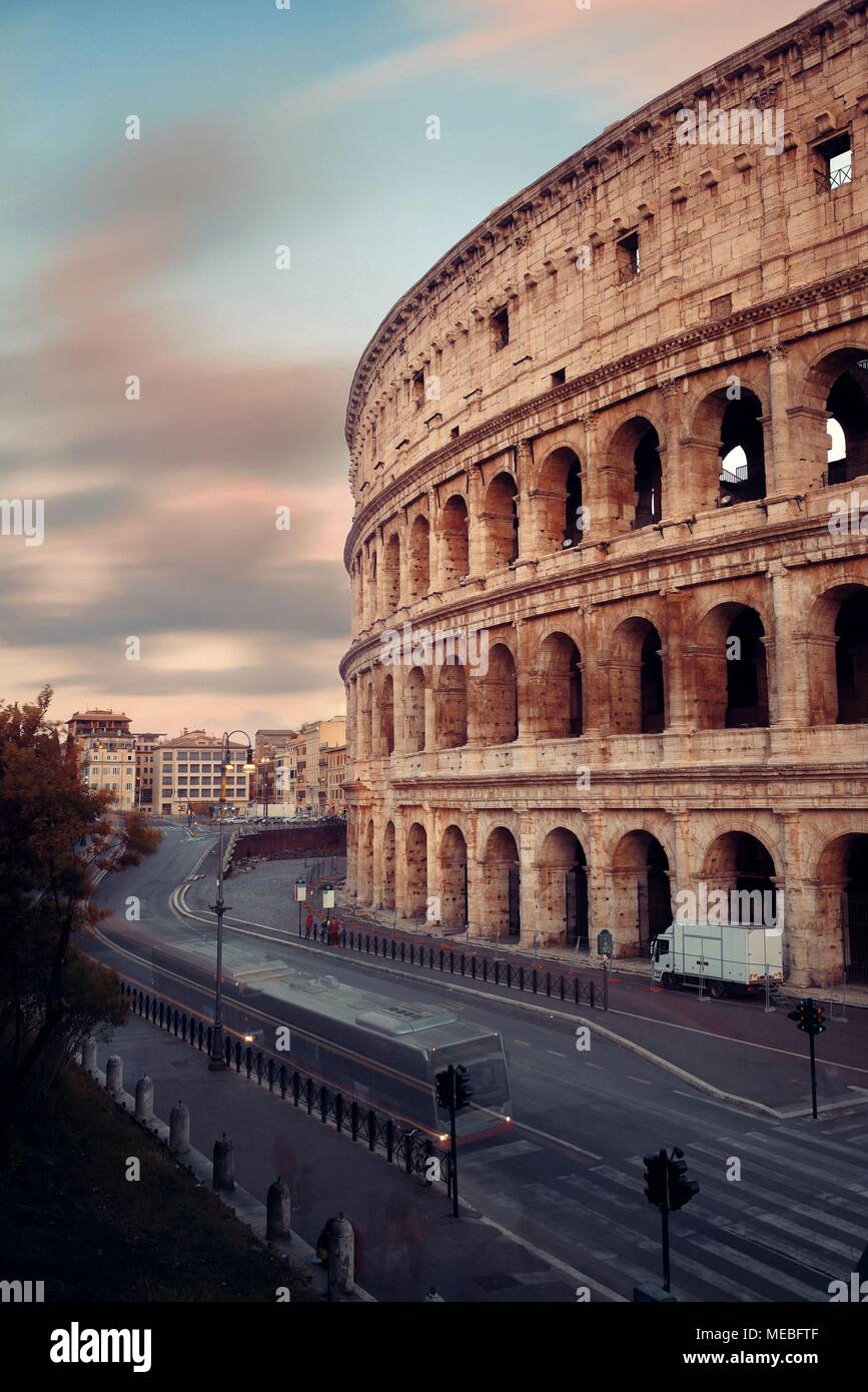 Colosseum with street view at sunset, the world known landmark and the ...