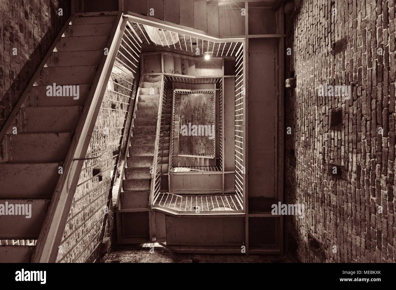 Staircase inside clock tower in Lucca with historic buildings in Italy ...