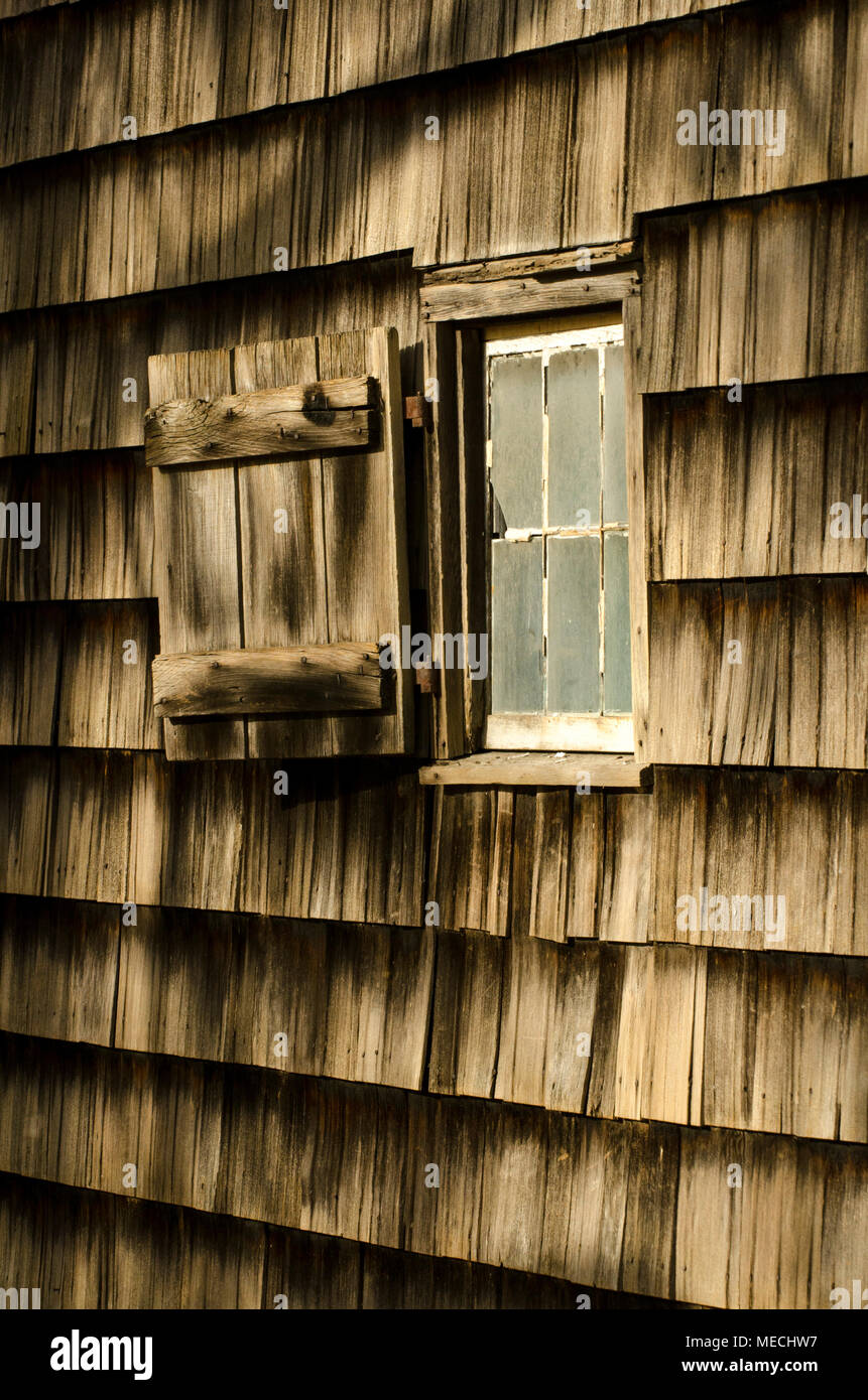 Window on weathered rustic cabin Stock Photo - Alamy