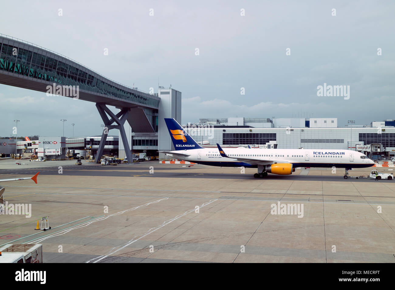 London Gatwick Airport, Surrey, UK 2018. Passenger airbridge, planes ...