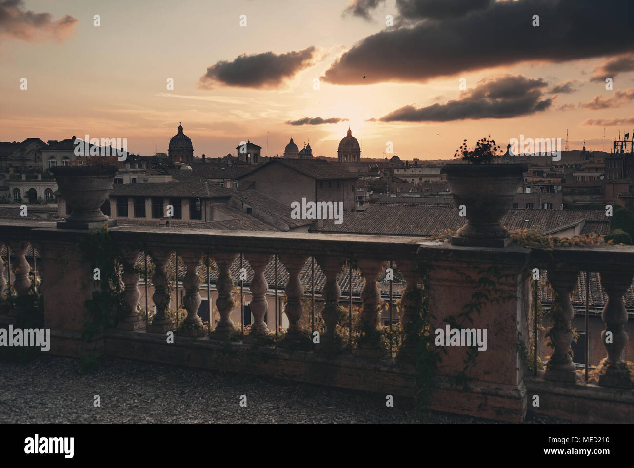 Rome rooftop view with ancient architecture in Italy at sunset moment ...