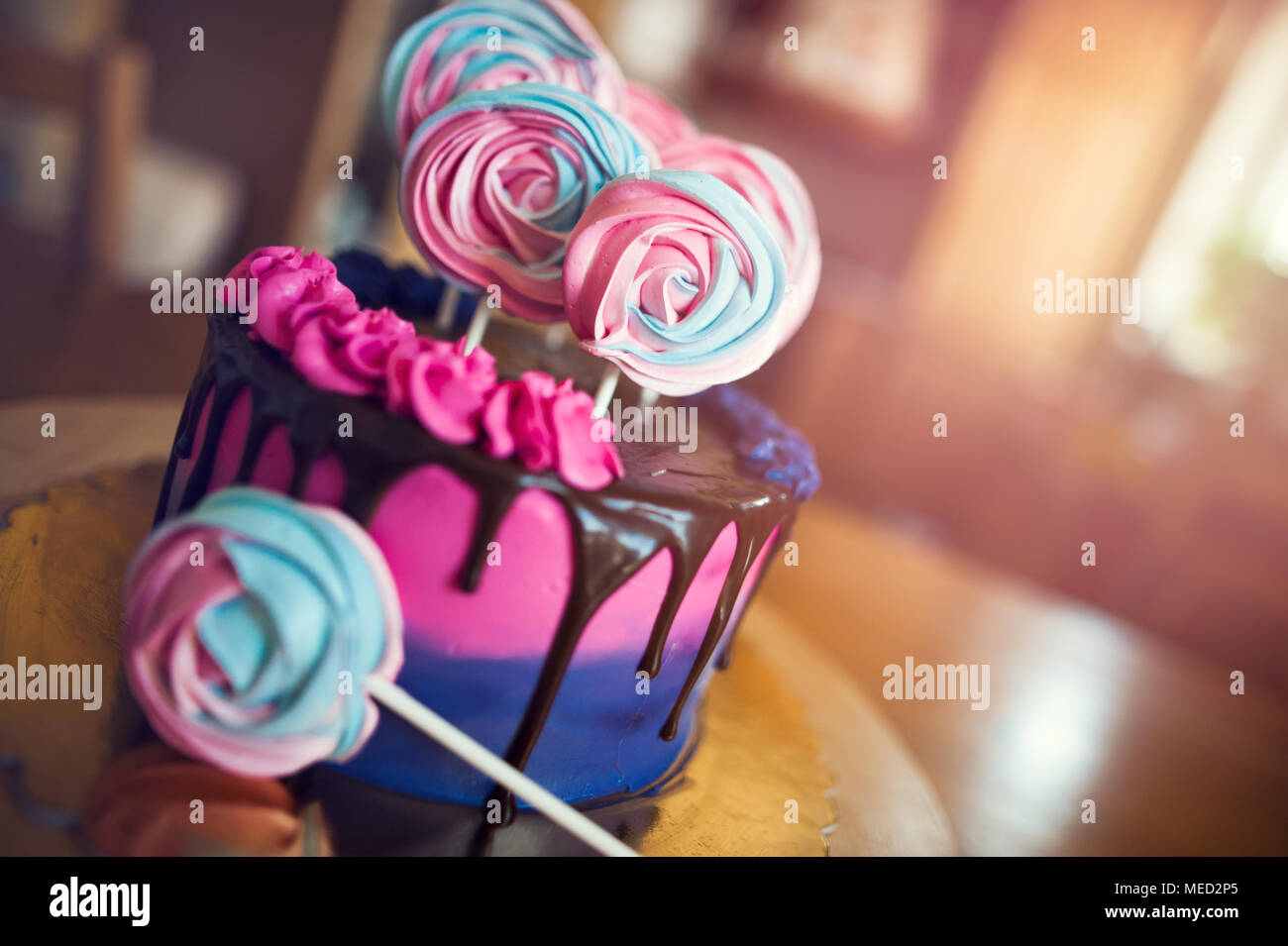 modern birthday cake full of colours and taste Stock Photo - Alamy