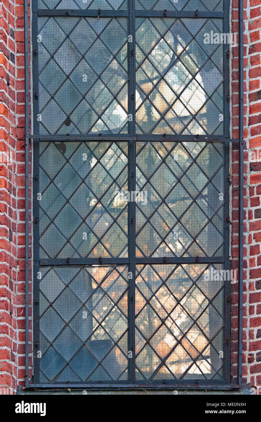 Brick through window hi-res stock photography and images - Alamy