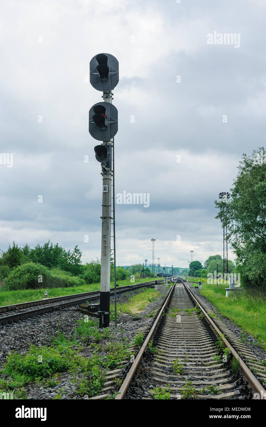 Railroad tracks into a distance. Semaphore is between tracks Stock ...