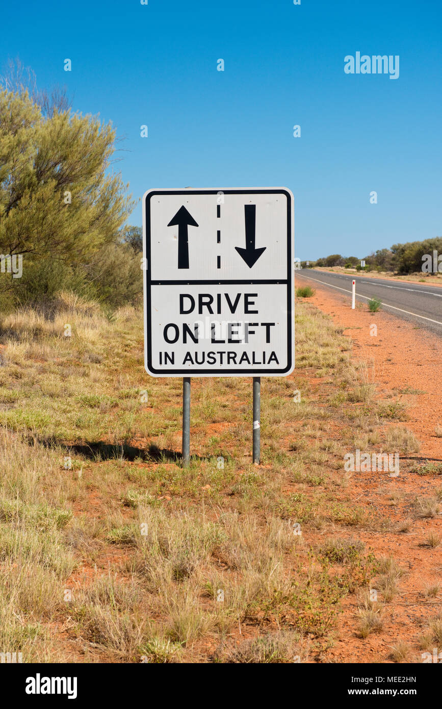 Drive on Left road sign in Australian outback. Lasseter Highway 4 Stock ...