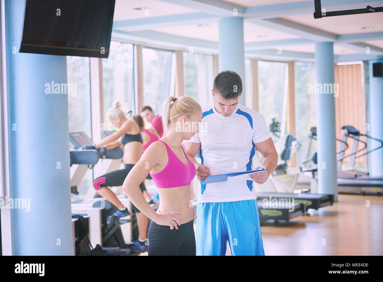 group portrait of healthy and fit young people in fitness gym Stock ...