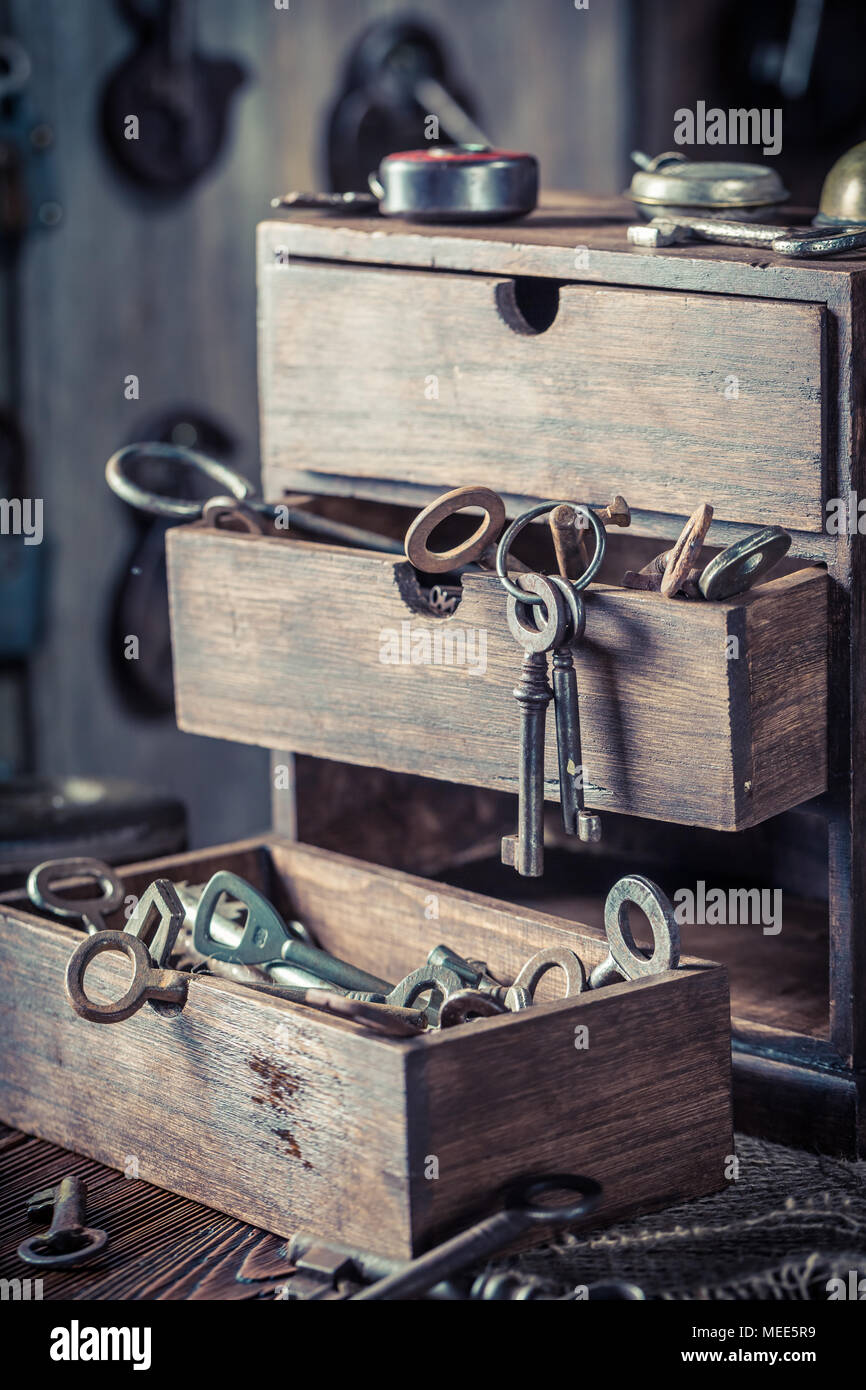 Wooden box with tools, locks and keys in locksmiths workshop Stock ...