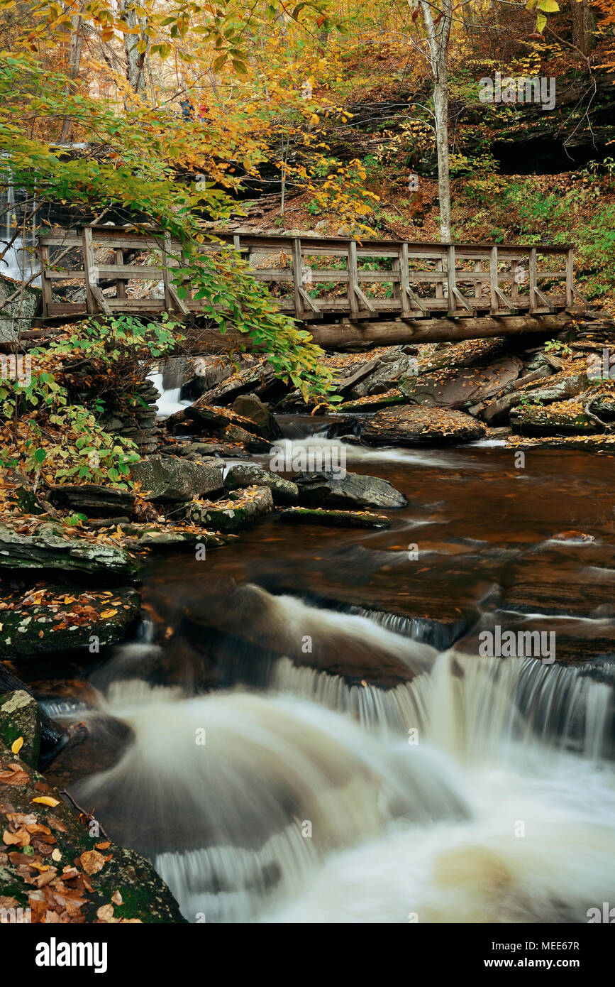 Autumn waterfalls in park with colorful foliage Stock Photo - Alamy