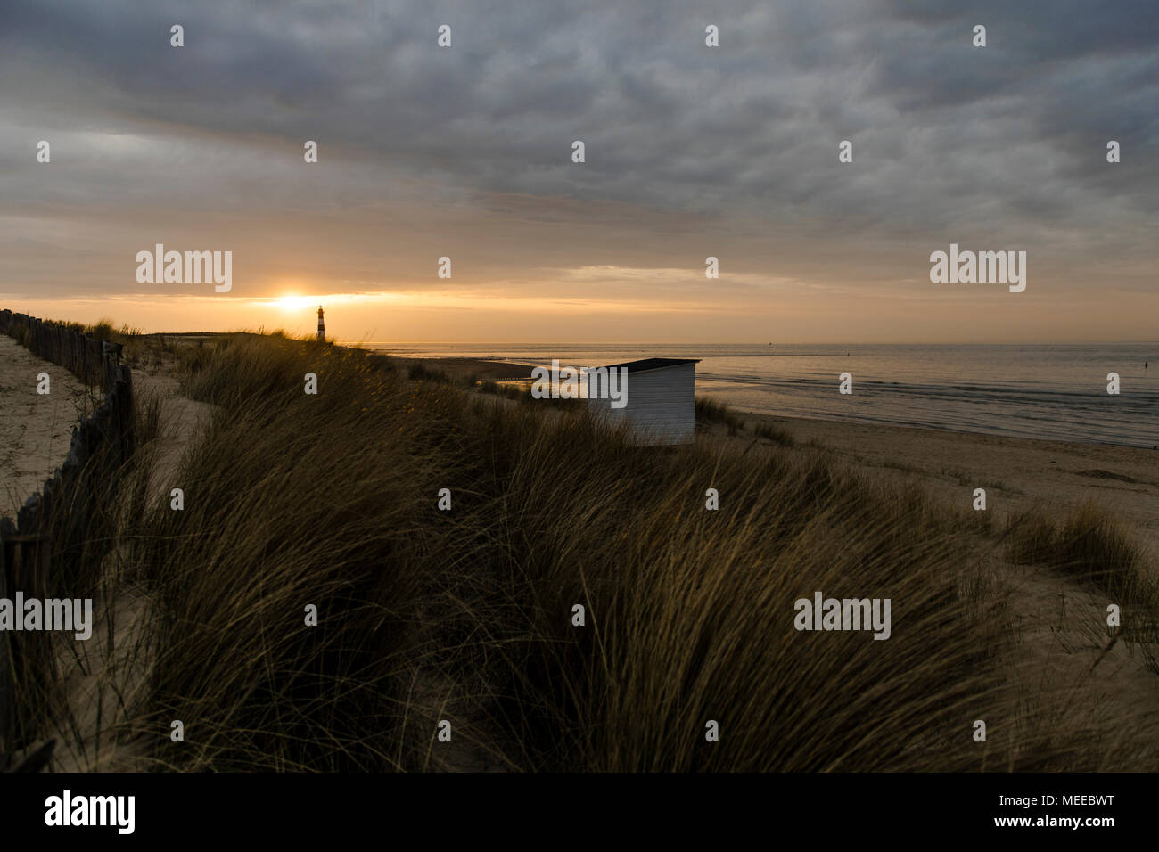 Lighthouse on a beach hi-res stock photography and images - Alamy