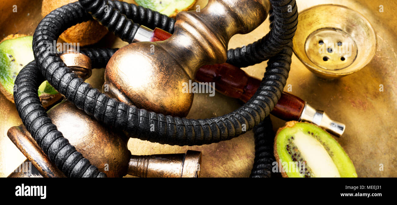 Oriental hookah with the aroma kiwi for relax.Kiwi shisha Stock Photo ...