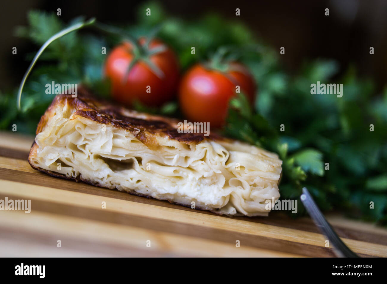 Su Boregi / Turkish Patty with tea on wooden surface Stock Photo - Alamy