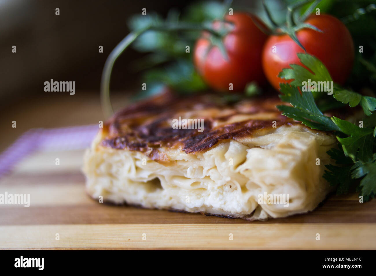 Su Boregi / Turkish Patty with tea on wooden surface Stock Photo - Alamy