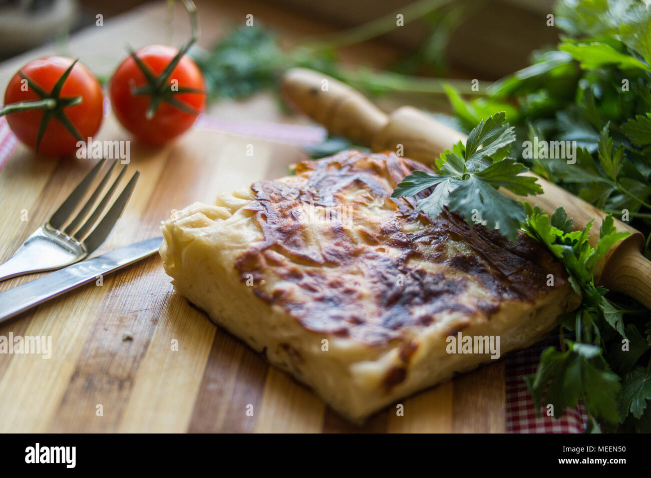 Su Boregi / Turkish Patty with tea on wooden surface Stock Photo - Alamy