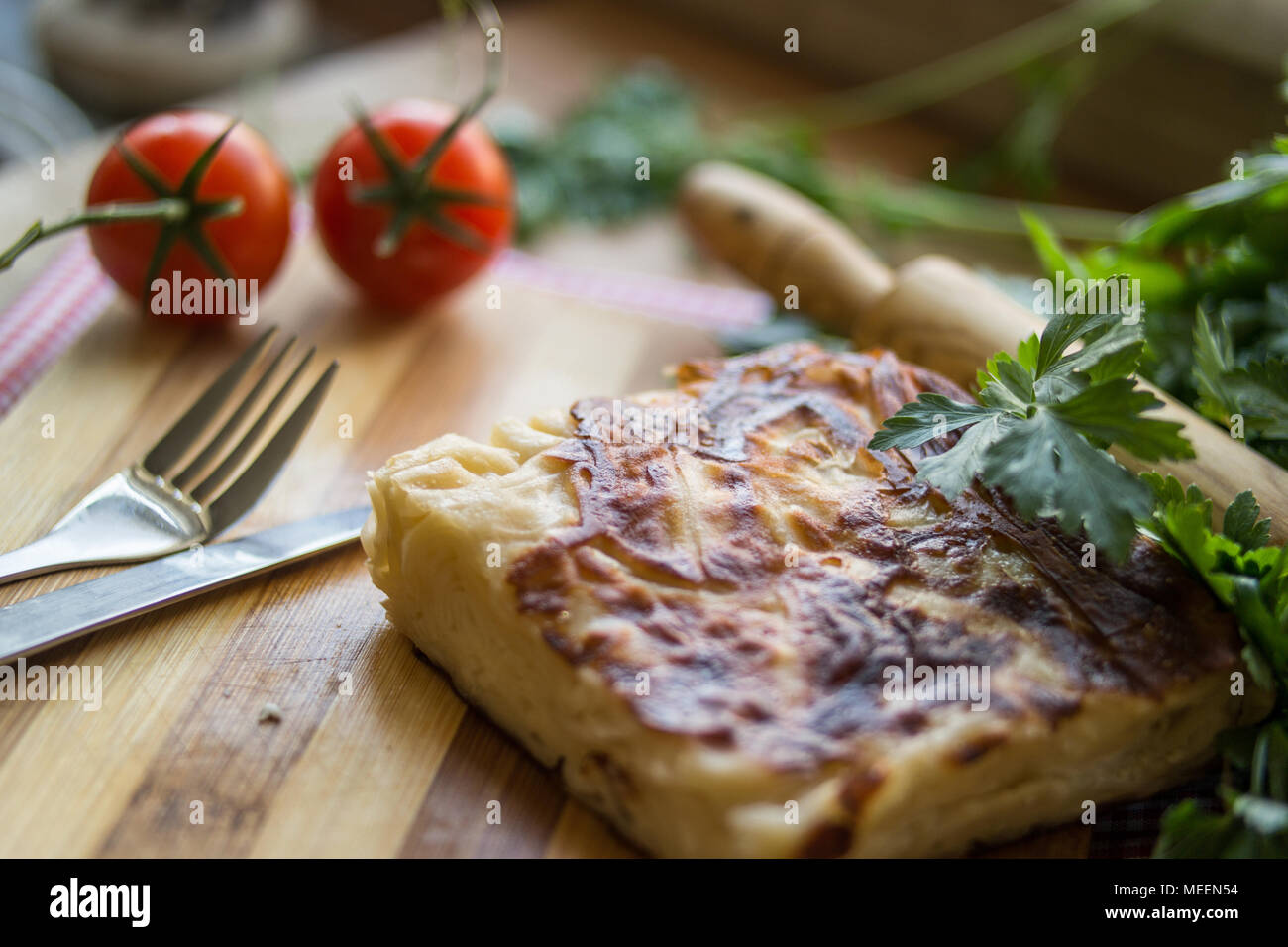 Su Boregi / Turkish Patty with tea on wooden surface Stock Photo - Alamy