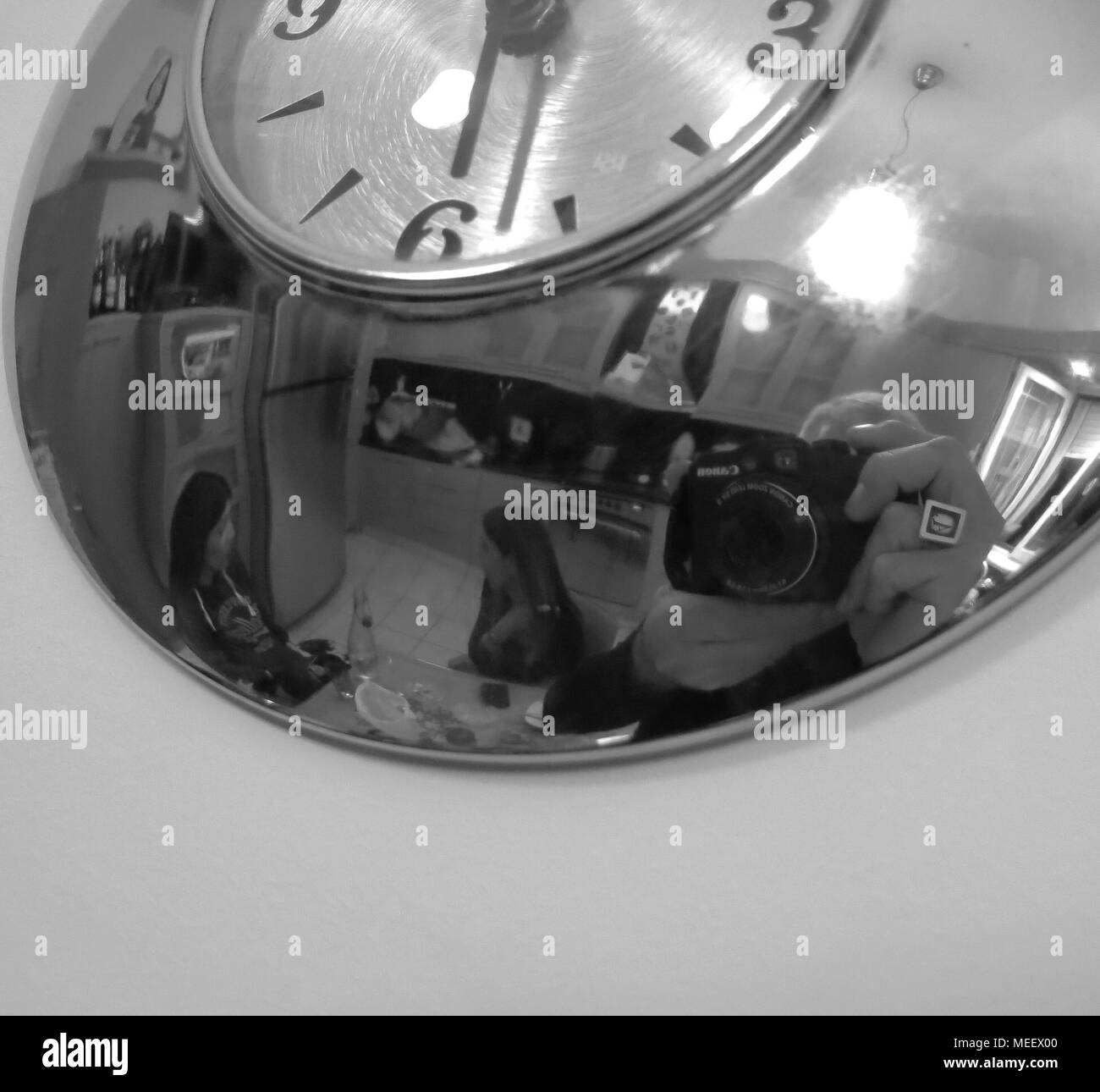 Distorted time clock hi-res stock photography and images - Alamy