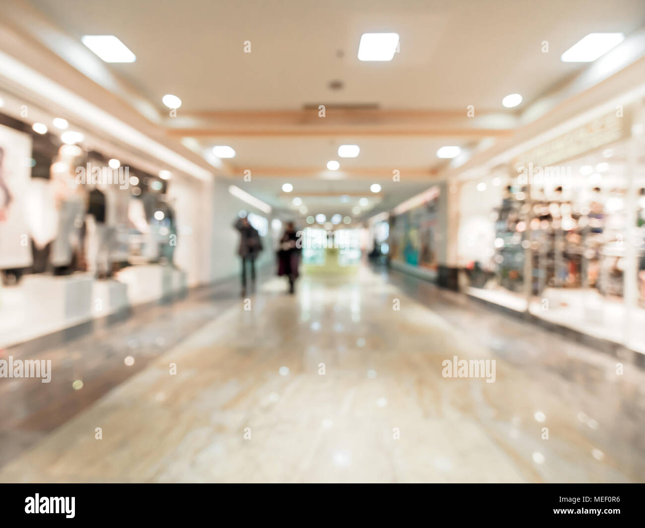 Shopping mall blur background with bokeh. Blurred hall of shopping mall ...