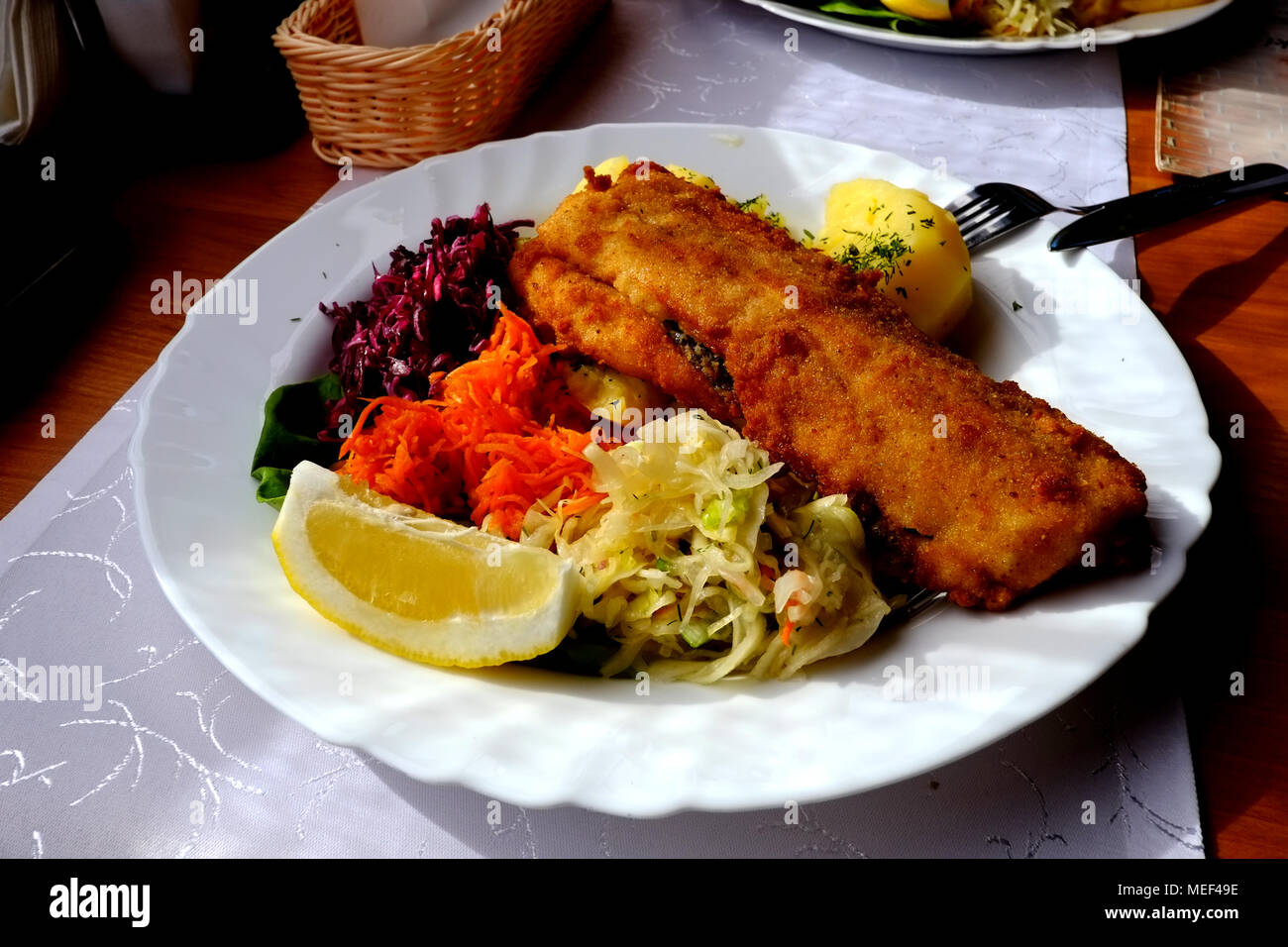 Fried Cod and Vegetables, Polish Style Stock Photo - Alamy