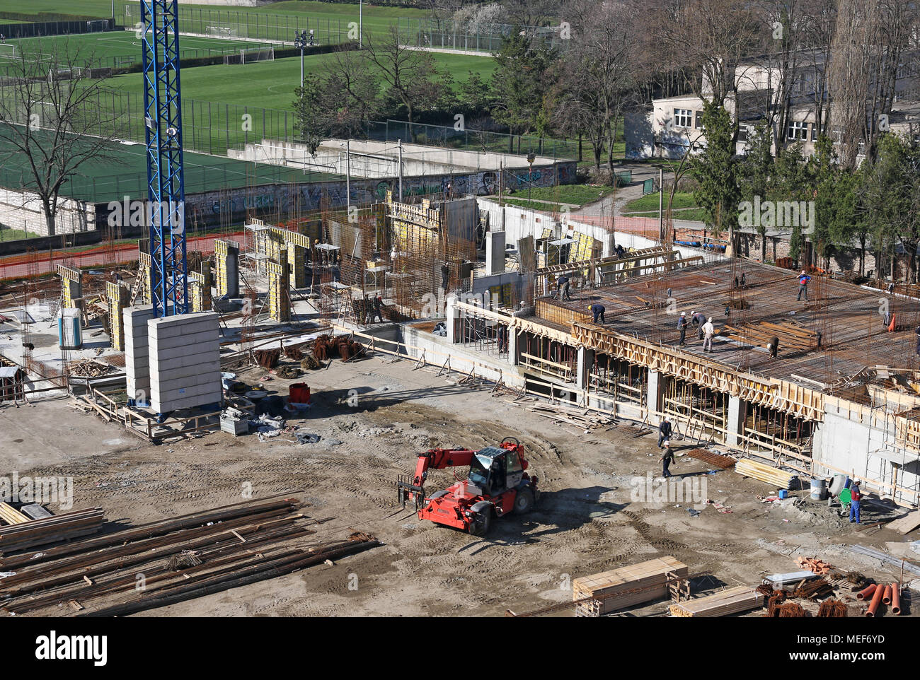 new building construction site with workers Stock Photo - Alamy
