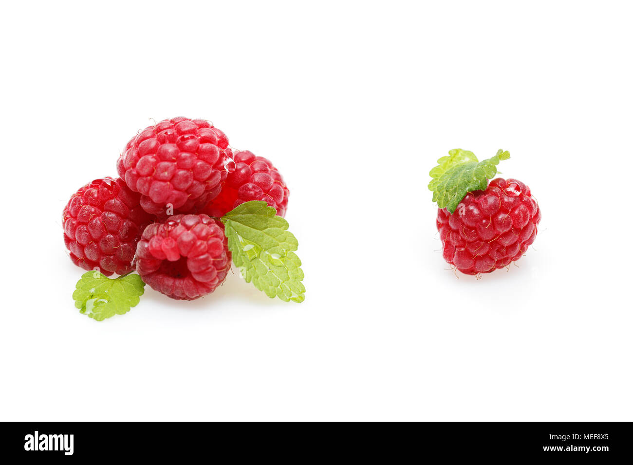 natural raspberry berries with mint leaf isolated on white background ...