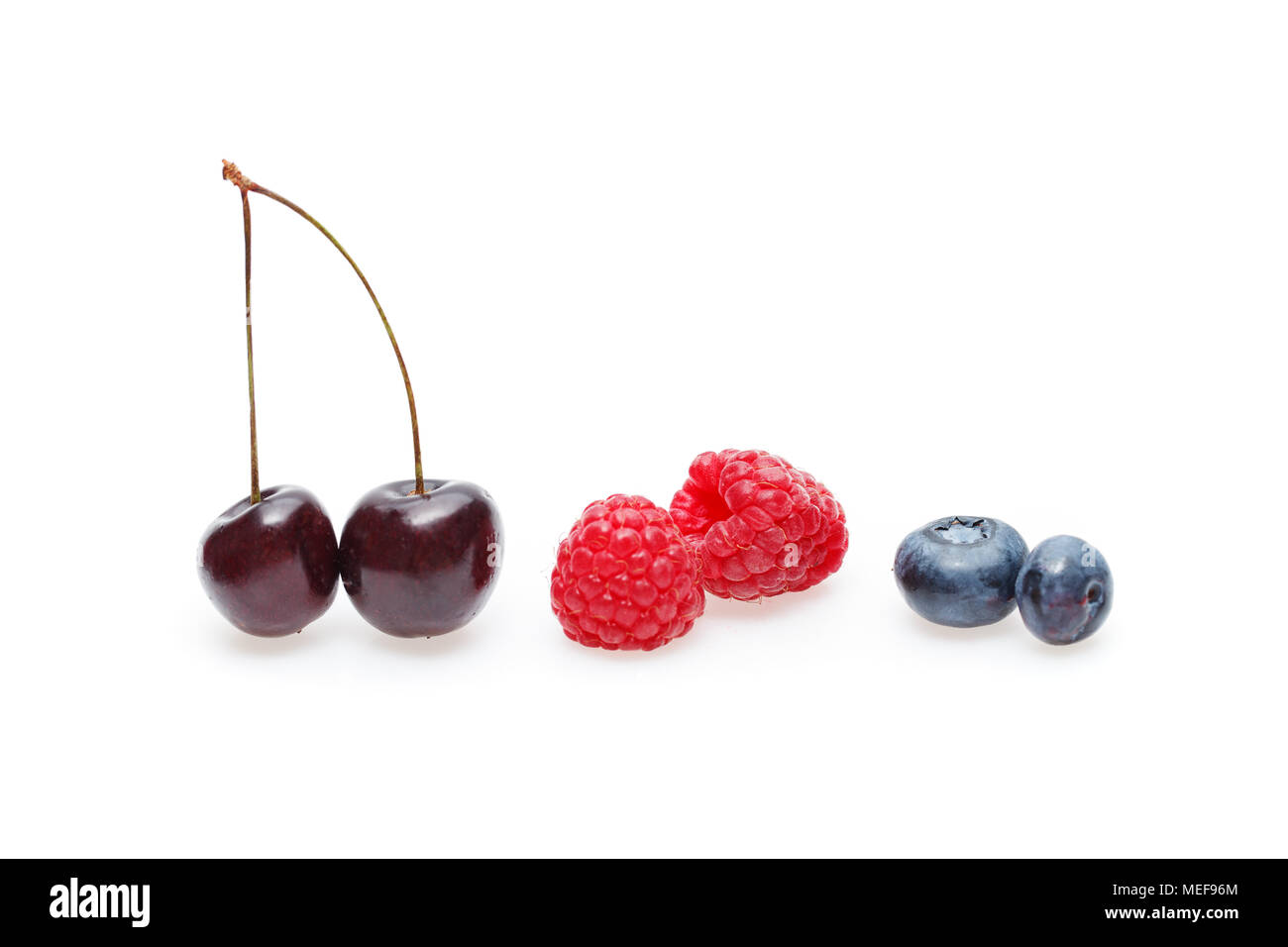 natural blueberry, cherry and raspberry berries isolated on white ...