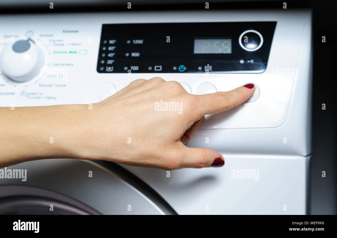 Woman powder washing machine hi-res stock photography and images - Alamy