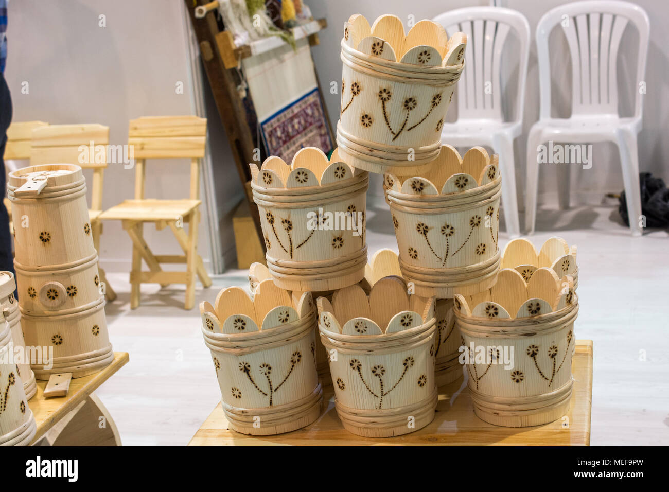 Set of buckets made of wood in a market place Stock Photo - Alamy