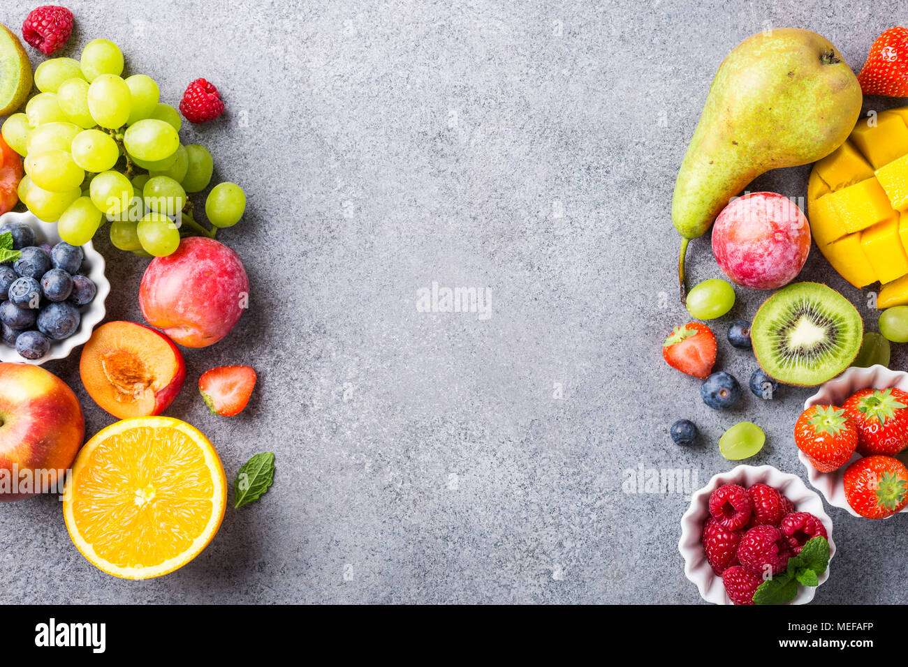 Fresh assorted fruits and berries Stock Photo - Alamy